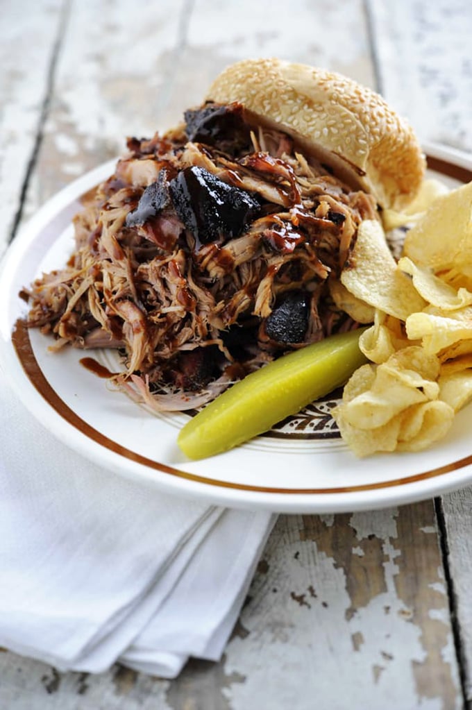 The pulled pork sandwich: where "messy" meets "marvelous." It's like a hug for your taste buds, wrapped in a bun.