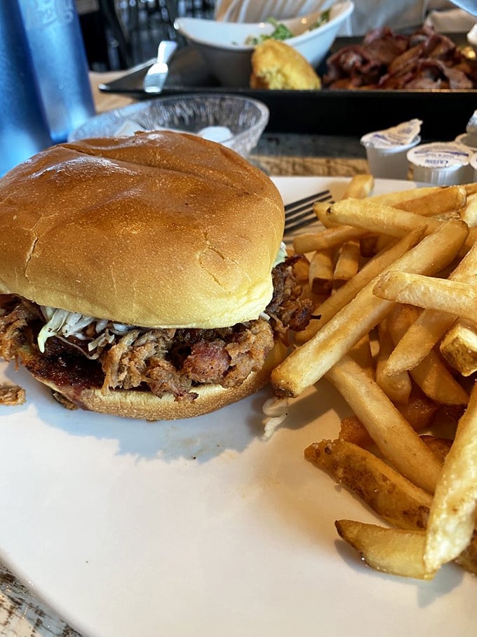 Pulled pork perfection! This sandwich is so packed with flavor, it's like a party in your mouth – and everyone's invited.
