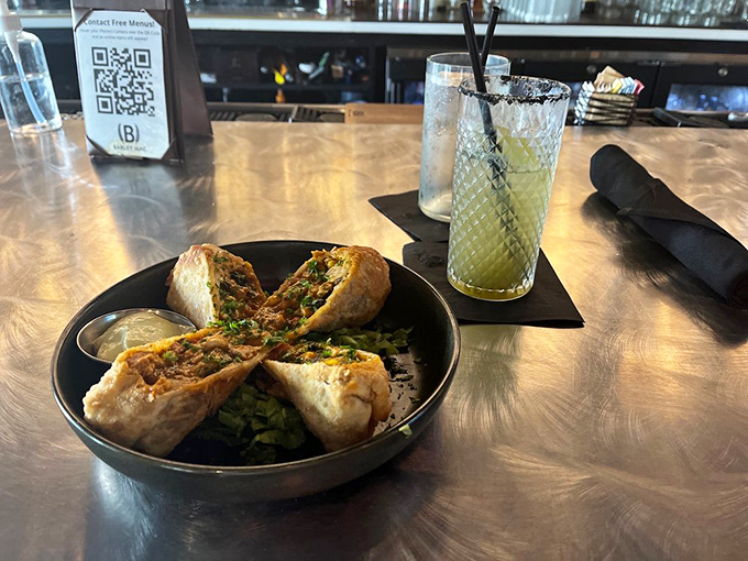 Roasted chicken eggrolls paired with a margarita &ndash; East meets West in a culinary handshake that works surprisingly well after a long day.