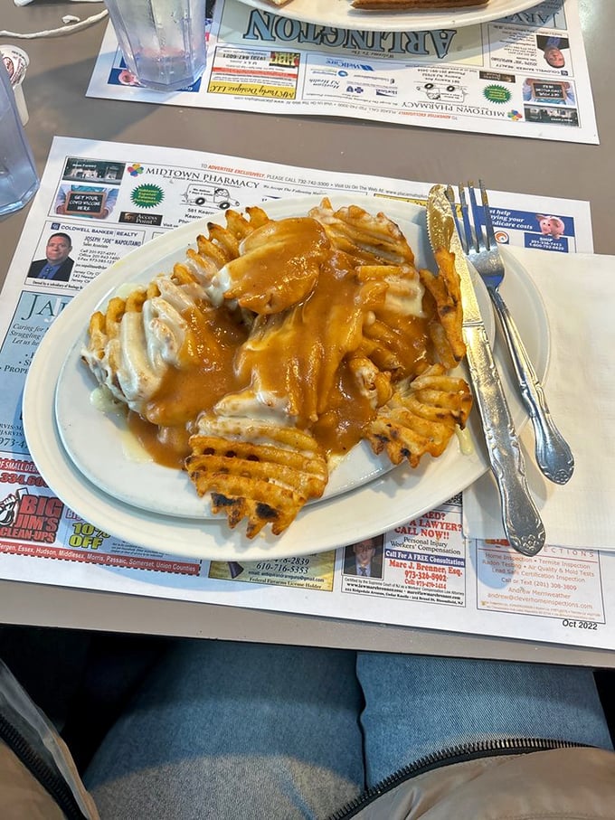 Disco fries gone wild! This cheesy, gravy-laden masterpiece is what happens when poutine takes a detour through New Jersey.