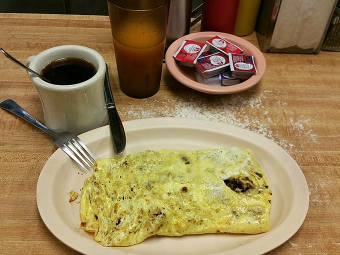 Omelette you in on a secret: this fluffy creation, packed with savory goodness, is the stuff breakfast dreams are made of.