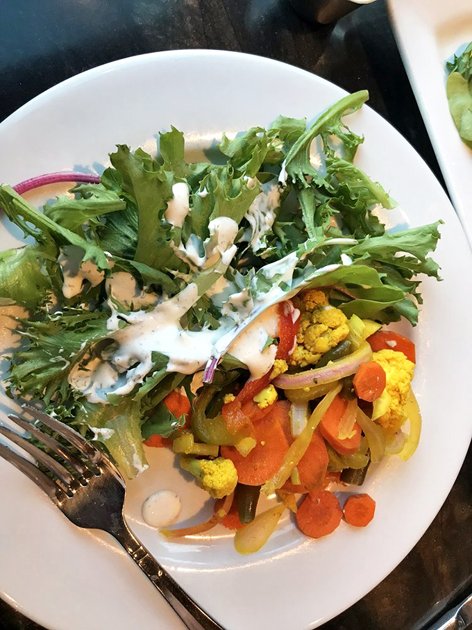 Even the salads here deserve their moment in the spotlight – a colorful medley that makes eating your vegetables feel like a reward, not a chore.