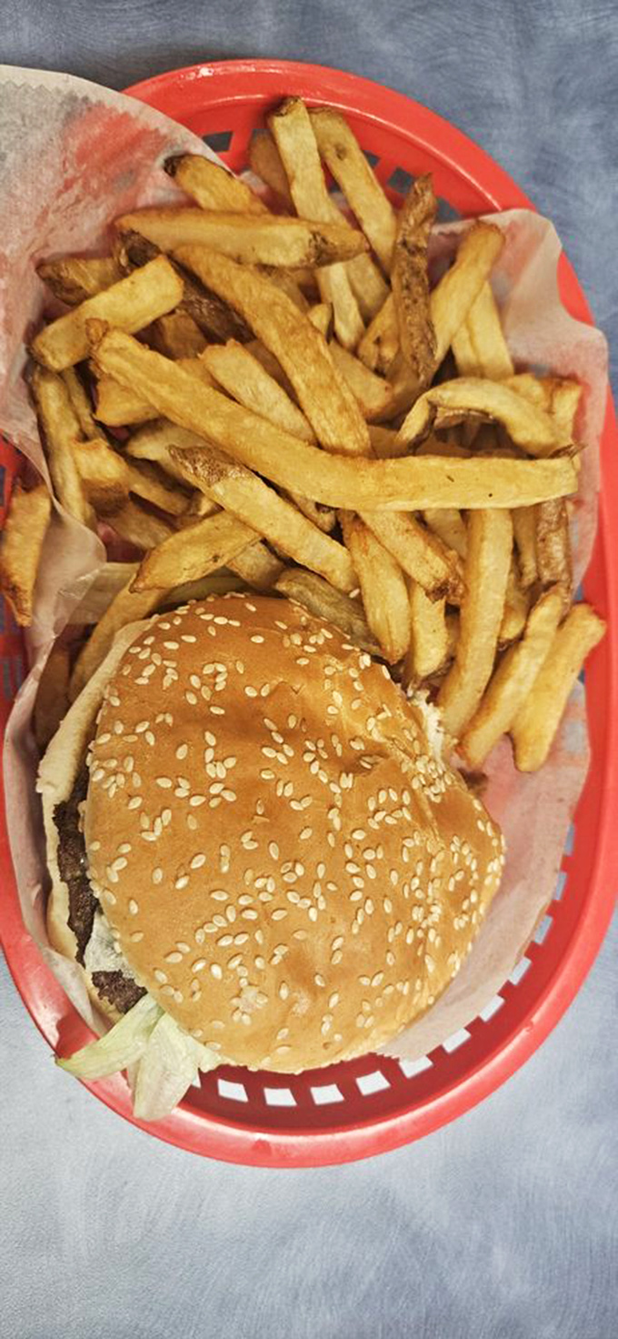 The burger that launched a thousand cravings! Golden fries and a perfectly grilled patty prove that sometimes, the simplest pleasures are the most satisfying.