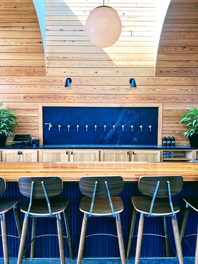 Pull up a seat at flavor central! Chomp's bar area is where beer dreams come true, with taps lined up like soldiers ready to quench your thirst.