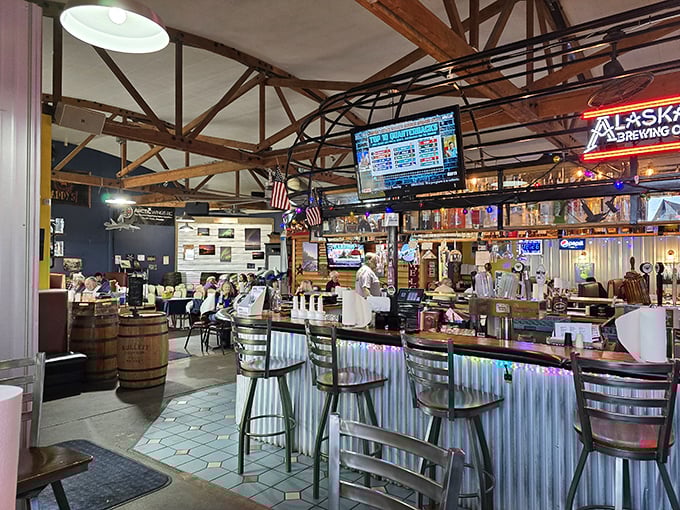 The bar area: where BBQ dreams are born and beer flows like a river. It's like Cheers, but with more sauce-stained napkins.