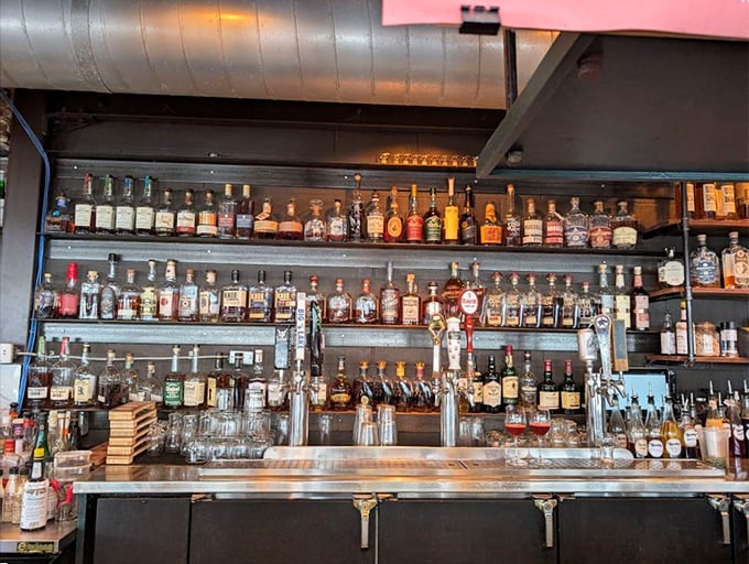 Welcome to libation station! This bar's got more bottles than a recycling center after New Year's Eve.