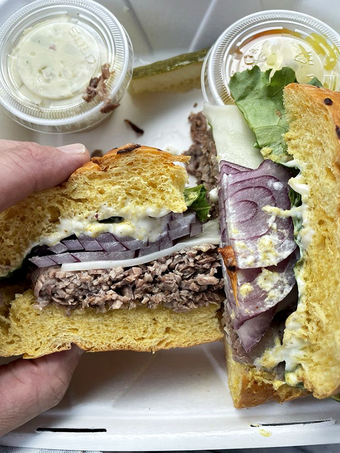 Brisket so tender, it practically melts on the plate. This sandwich is a hug for your taste buds.