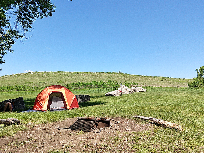 Camping in the Flint Hills means waking up to an ocean of grass, where your morning coffee comes with a side of prairie sunrise.