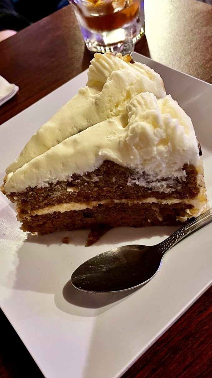 Carrot cake that doesn't pretend to be health food, just unabashedly delicious decadence with frosting that deserves its own fan club.