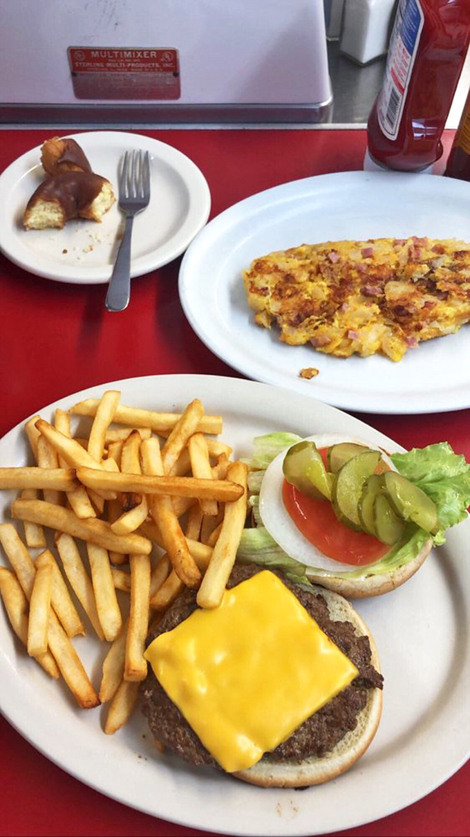 The burger-fries-omelet trinity proves Cindy's isn't just a breakfast joint&mdash;it's an all-day affair with comfort food that never goes out of style.