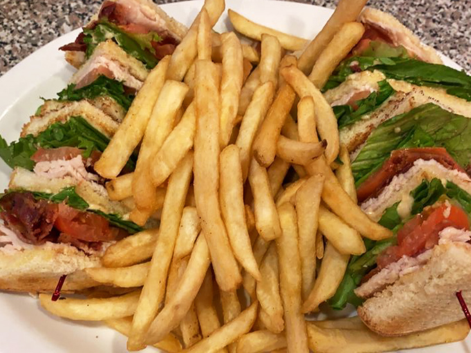 A club sandwich that's a skyscraper of deliciousness. It's the Empire State Building of lunch, minus the King Kong-sized indigestion.