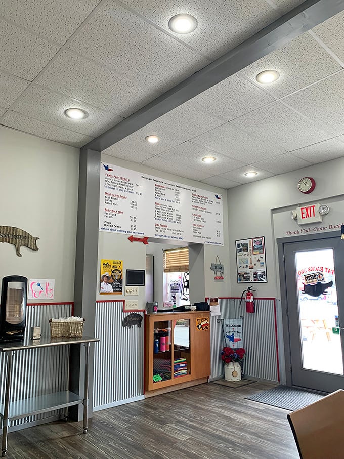 The ordering counter&mdash;where dreams are made and diets go to die. That metal pig silhouette watches over the proceedings like a patron saint.