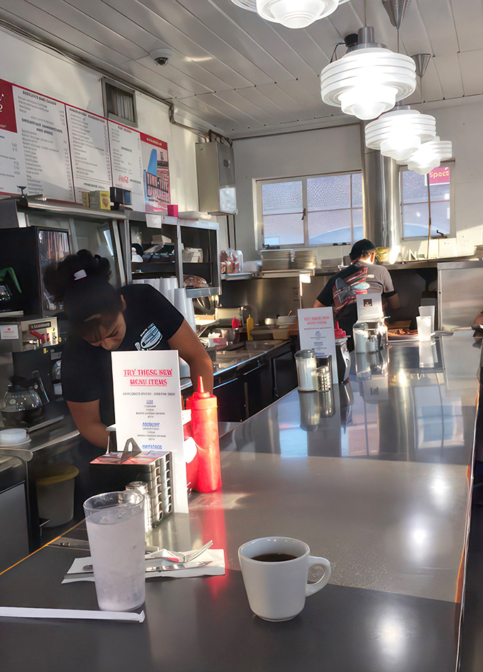 Where the magic happens! Watch short-order wizards conjure up deliciousness faster than you can say "over easy."