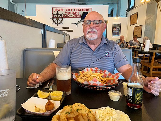 A feast fit for Poseidon himself! This happy diner's spread looks like it could feed a small fishing village.
