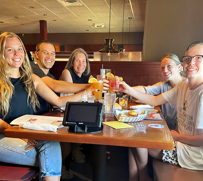 Cheers to good company: Nothing beats sharing laughs and lobster with friends. It's like "Friends," but with more butter and less Ross.