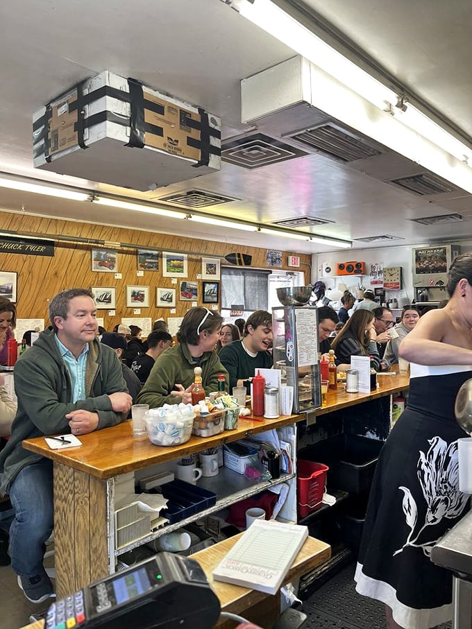 Where strangers become friends over shared love of good grub. This counter is the United Nations of breakfast diplomacy.