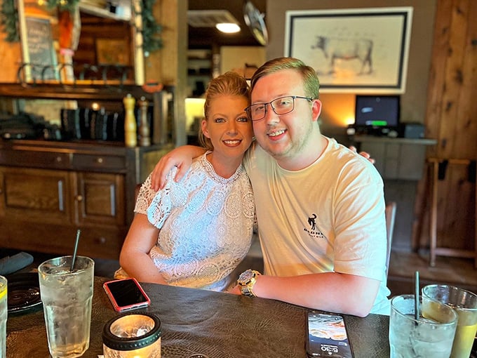 Happy diners caught in their natural habitat. Notice the telltale signs of a great meal: big smiles and loosened belts.