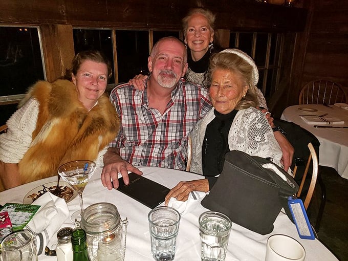 Happy faces around the table - the universal sign of a great meal. These folks look like they've found their new favorite spot.