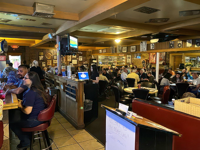Happy diners, lively chatter, and the promise of good food. It's like Cheers, but with better steaks and no Norm hogging the bar.