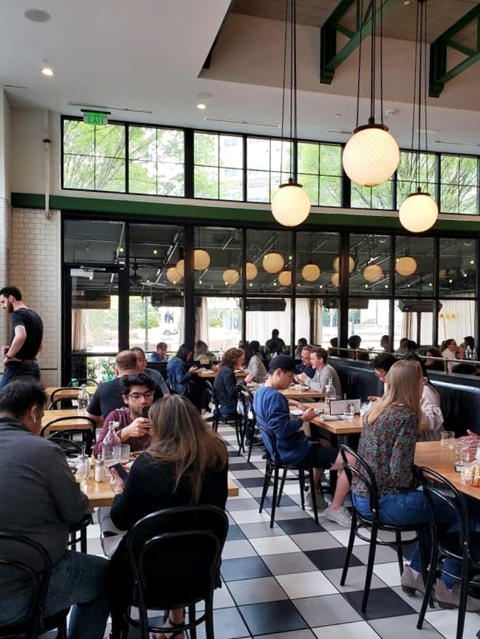 Happiness is a full house! This bustling dining room is serving up more smiles than a laugh track.