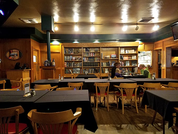 Part library, part dining room, all charm. This cozy nook proves that good food and good books are the best recipe for a perfect evening.