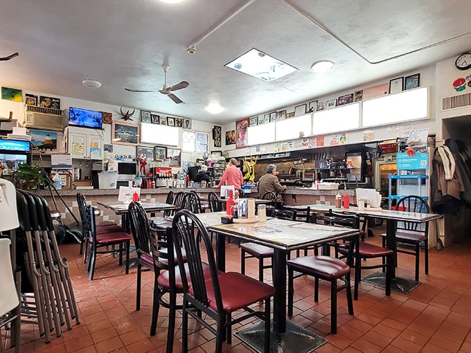 Pull up a chair and join the breakfast club. This dining area is where strangers become friends over shared syrup spills.