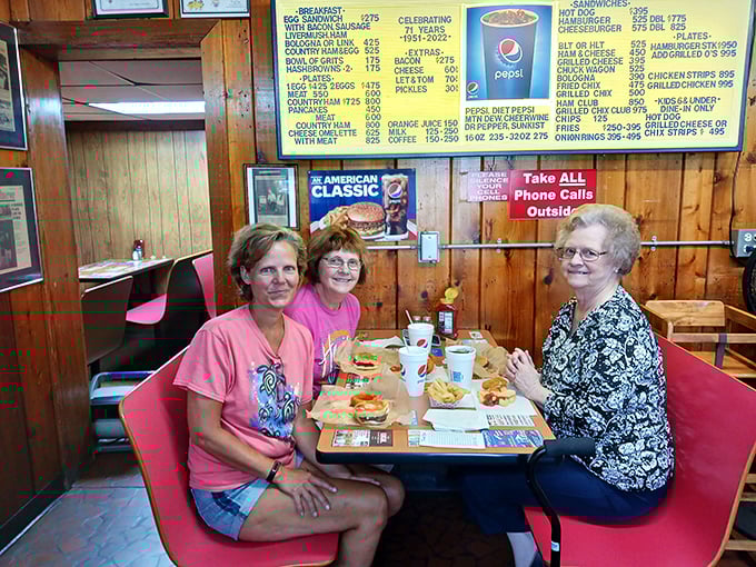 Red booths and wood paneling: the classic diner uniform. It's like stepping into an Edward Hopper painting, but tastier.