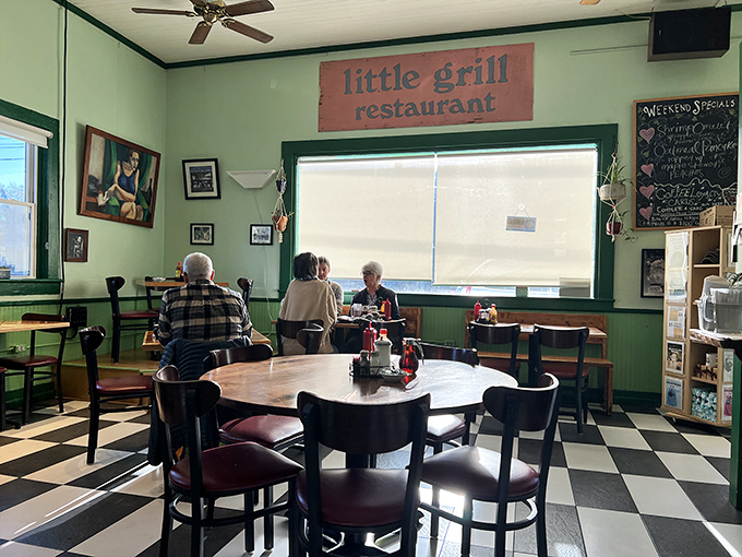 Where breakfast dreams come true! This cozy dining area is like your cool aunt's living room, but with better food and fewer cat photos.