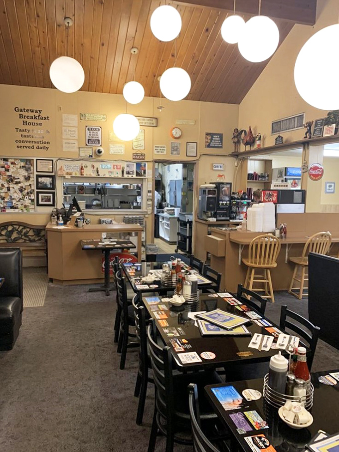 Welcome to breakfast paradise! This cozy dining area, with its wood-paneled charm, is where morning dreams come true.