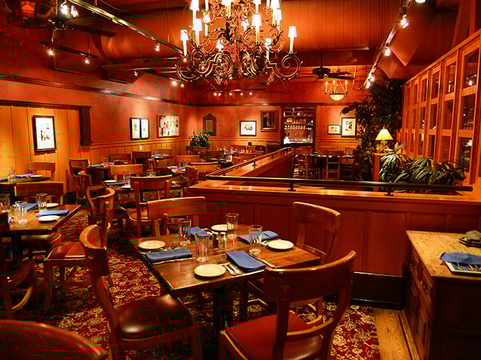 Orso's dining room: where rustic charm meets culinary magic. With chandeliers overhead and comfort underfoot, it's like dining in a posh Alaskan lodge.