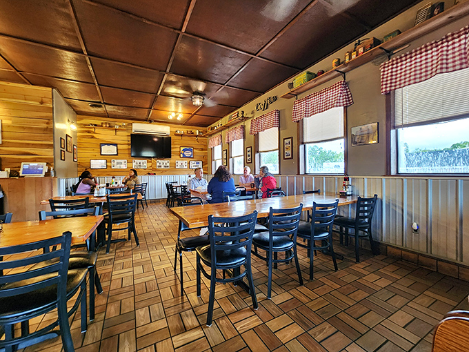 Where strangers become friends over eggs. This dining area is like a cozy living room, but with better food and fewer remote control fights.