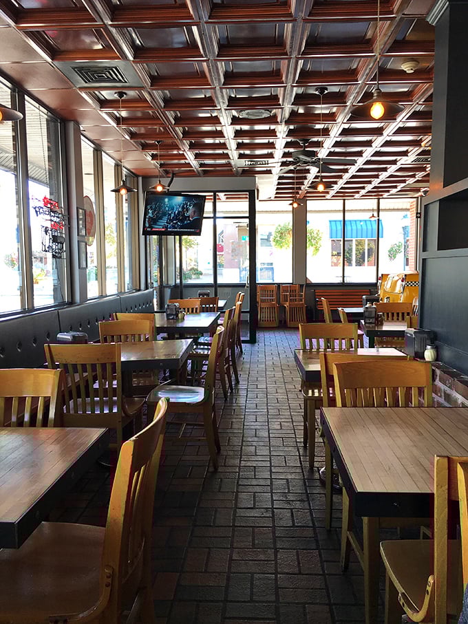 Cozy up in AJ's dining area, where the atmosphere is as warm and inviting as a fresh-from-the-oven slice on a cold day.