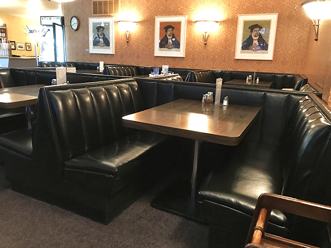 Cozy booths and quirky art create an atmosphere that's part 'Cheers,' part 'Alice,' and 100% delicious nostalgia.