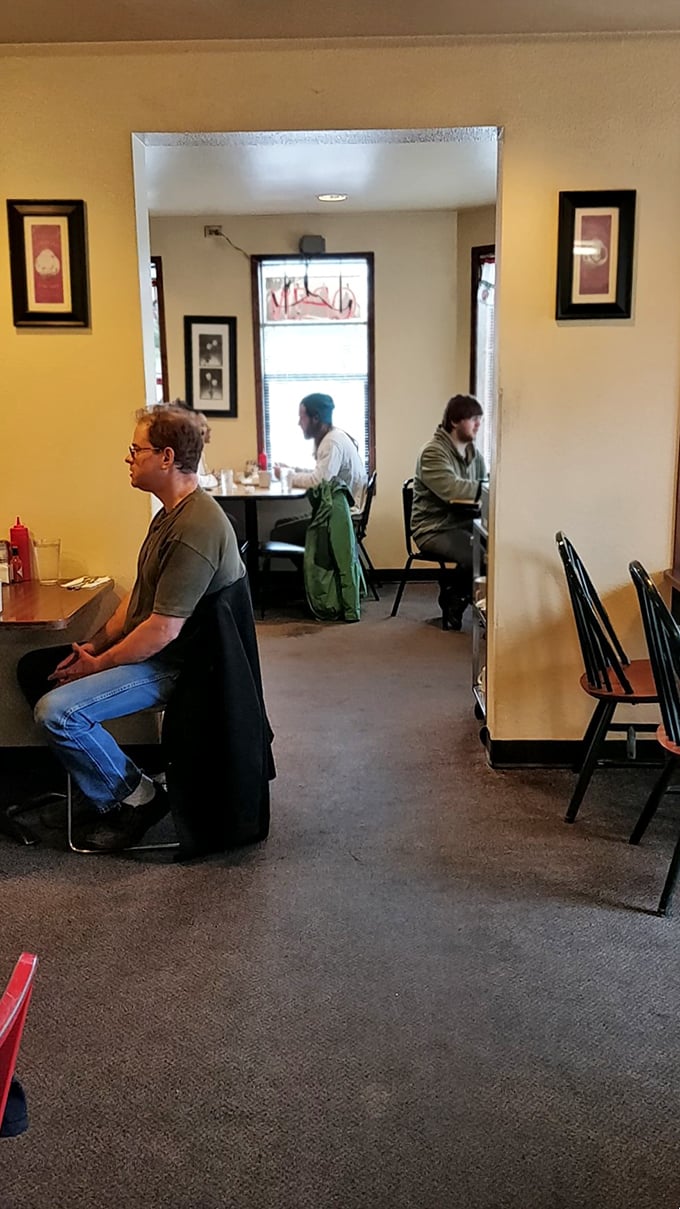Where strangers become friends over flapjacks. This dining area has seen more heart-to-hearts than a therapist's couch.