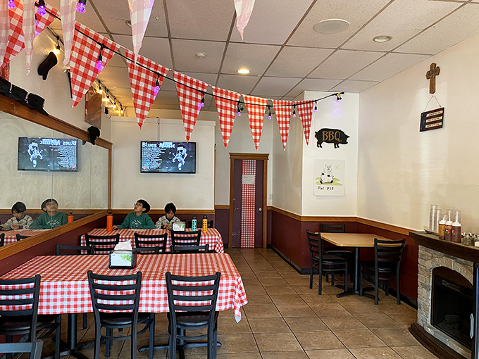 Red and white checkers set the scene for BBQ dreams. It's like your grandmother's kitchen got a smoky makeover &ndash; comfort food paradise awaits!