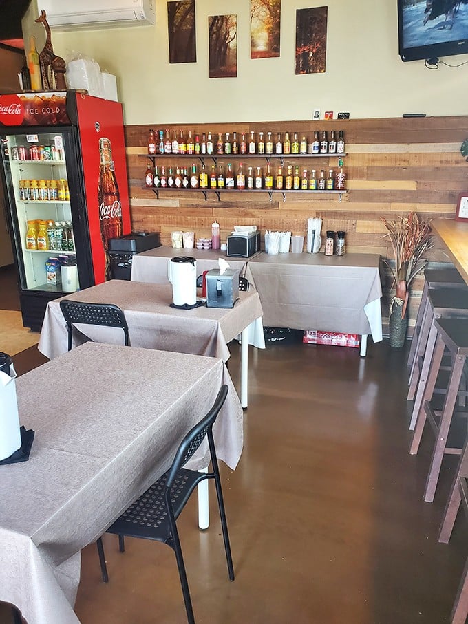 Rustic charm meets modern comfort in this dining area. It's like eating in a Pinterest board come to life.