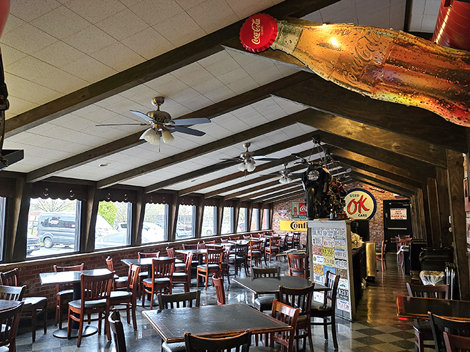 The expanded dining area features wooden beams, ample natural light, and enough space for the crowds that flock here like, well, chickens.
