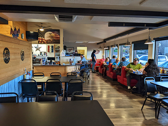 Where strangers become temporary breakfast companions. The morning light streams in, illuminating a diner that hasn't changed its recipe for success in decades.