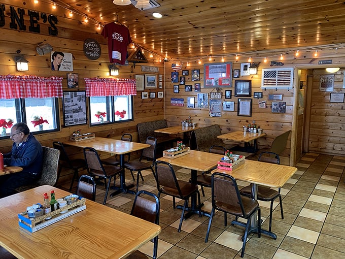 Red-checkered curtains, wood-paneled walls, and tables ready for hungry diners &ndash; the stage is set for breakfast theater at its finest.