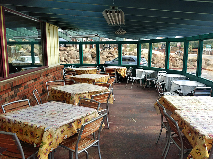 The sunlit dining area offers a bright contrast to the deeply smoky flavors. Those tablecloths have witnessed countless "mmm" moments.