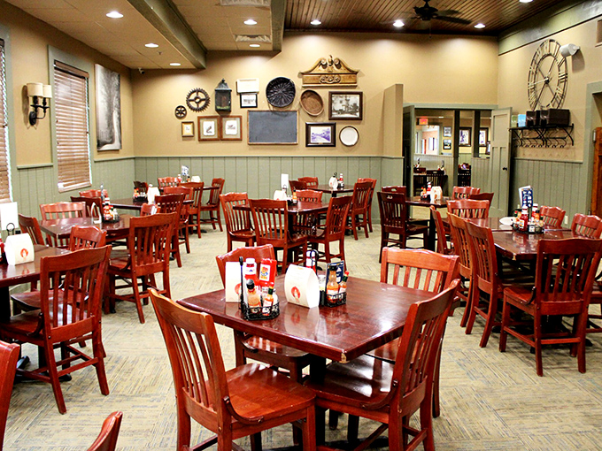 The dining room wall gallery tells stories without words&mdash;decades of community, family, and barbecue tradition hanging alongside vintage finds and local memorabilia.