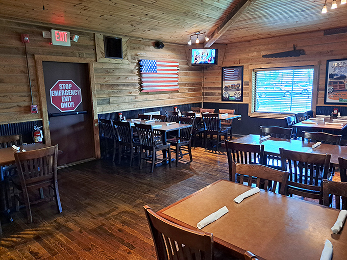 Rustic chic meets down-home comfort. With an American flag proudly displayed, this dining area serves up patriotism alongside its prime cuts.