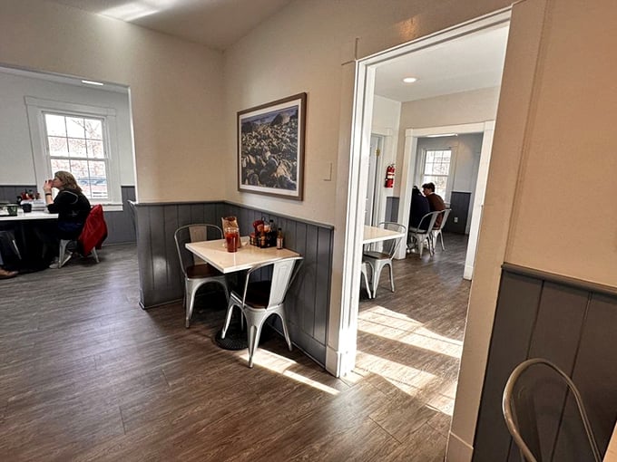 Cozy corners and warm wood tones &ndash; this dining area feels like your favorite aunt's kitchen, if she were a gourmet chef.