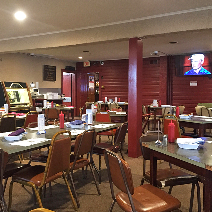 Where strangers become friends over shared sauce stains! This dining area is like your grandma's kitchen, if grandma could smoke a mean rack of ribs.