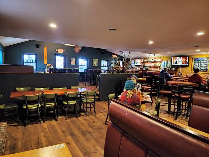 Cozy booths, warm lighting, and is that another bike? This dining area is like a hug for your stomach.