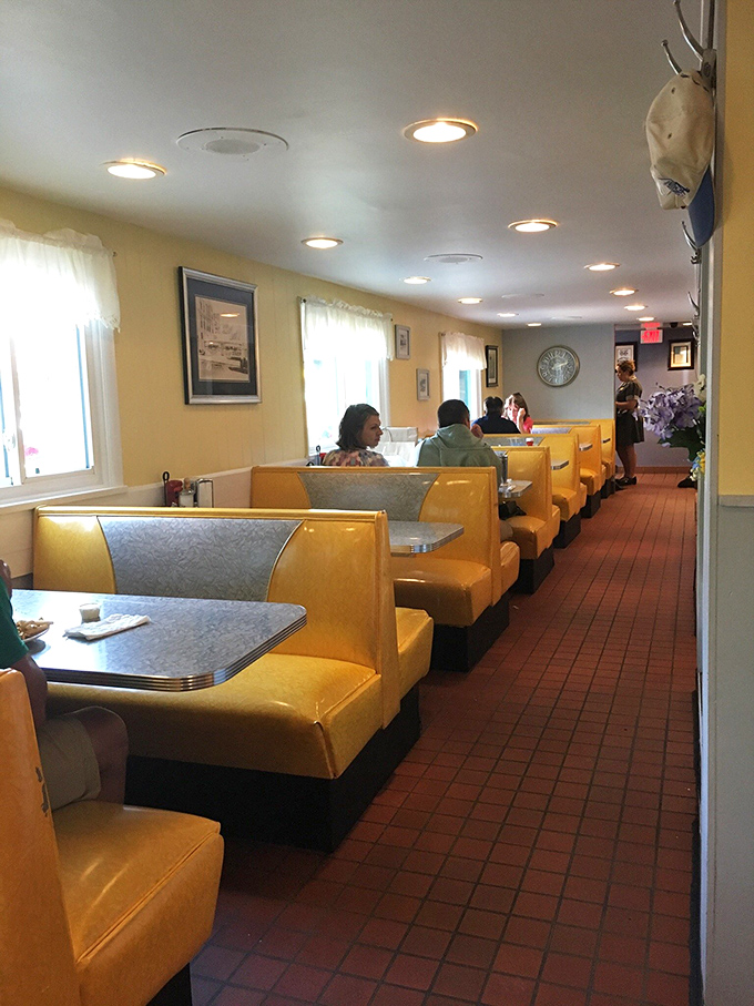 Yellow submarine, anyone? The cheerful booths and warm lighting make this dining area feel like a sunny day, even if it's pouring outside.