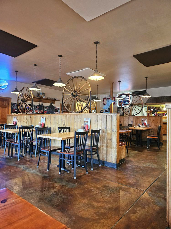 Wagon wheels and wooden booths: where the Old West meets modern comfort. It's like dining in a John Wayne movie, but with better food!