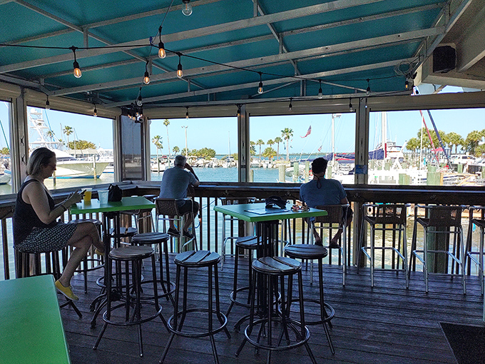 Dining with a side of boat-watching. It's like dinner and a show, but the boats are the stars!