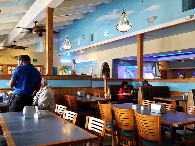 A dining room that's part beach house, part seafood shrine. You half expect to see mermaids swimming by the windows!