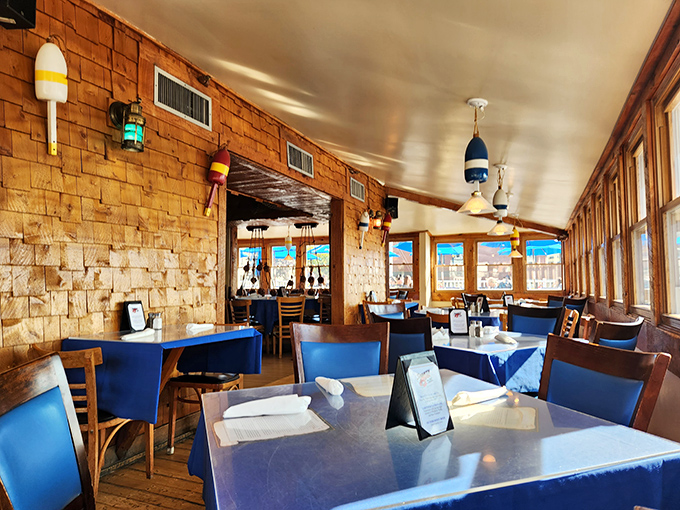 Nautical charm meets cozy comfort. This dining area feels like the below-deck of a luxury yacht, minus the seasickness.